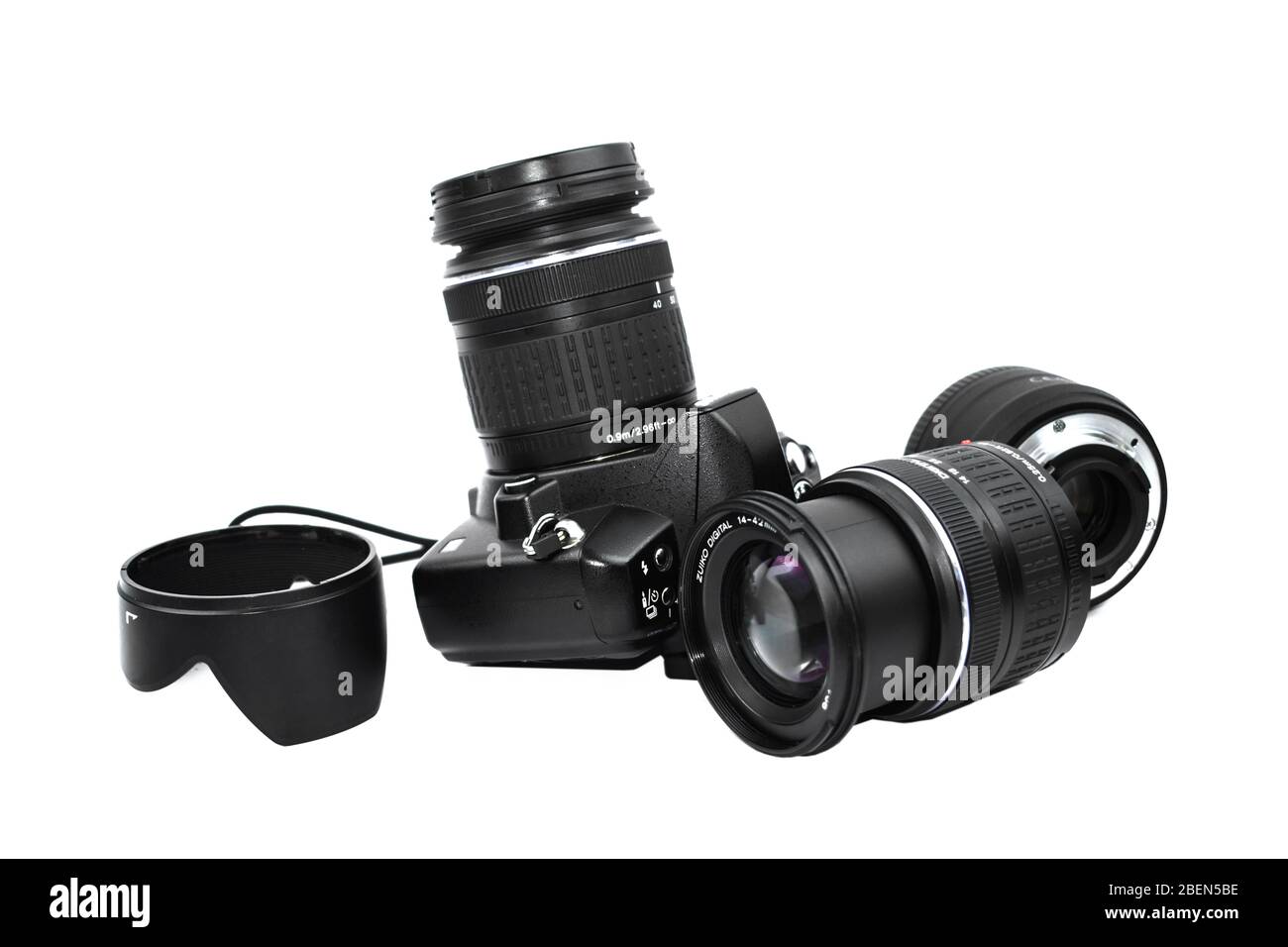 Some different part of a black digital camera scattered across an ...