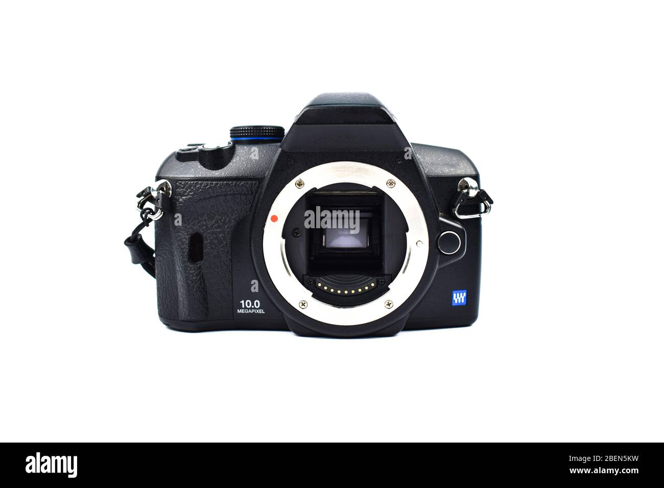 A black digital camera without a lens placed on top of a white isolated ...