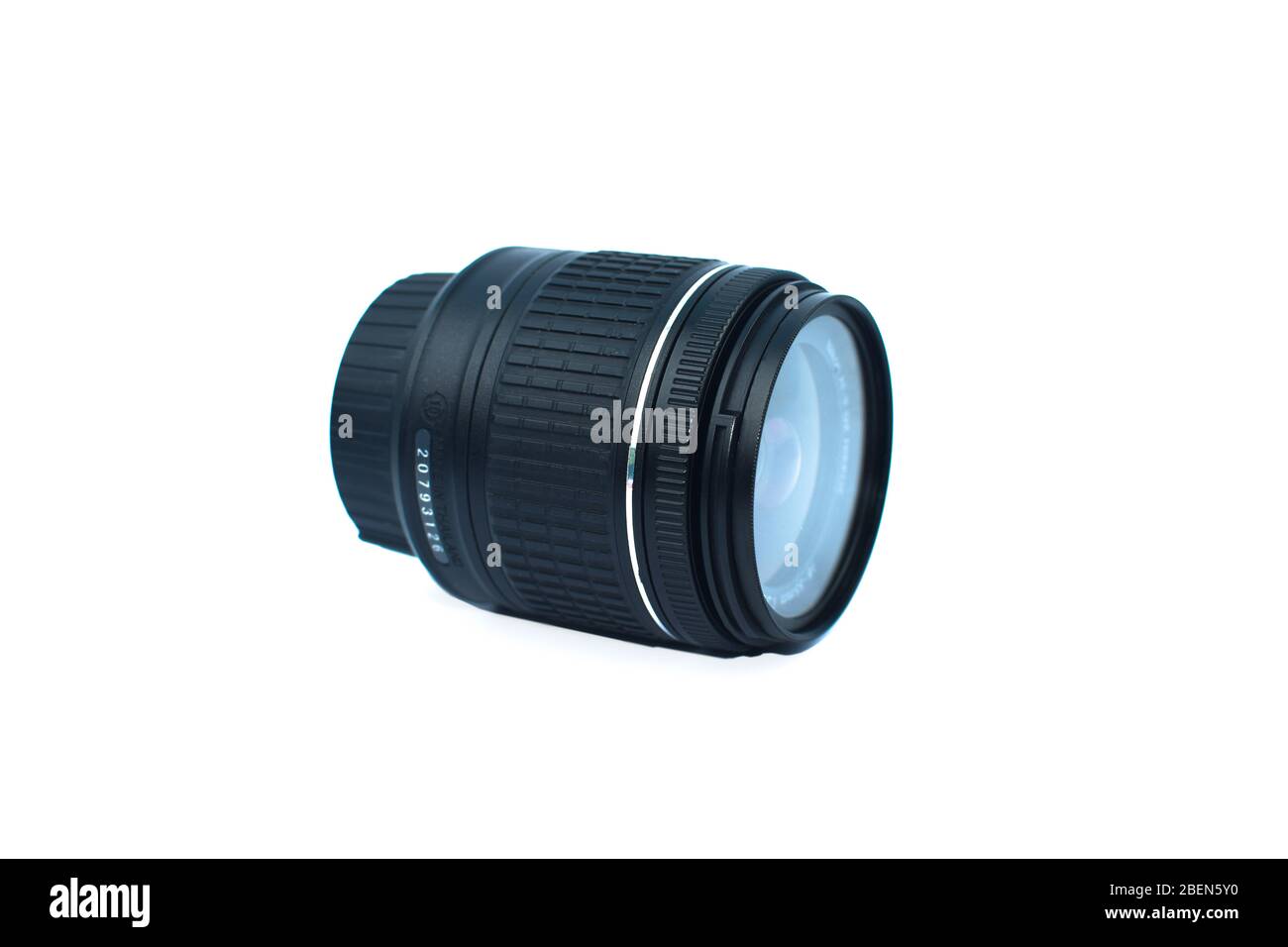Close up of a black color camera lens of a digital camera placed over ...