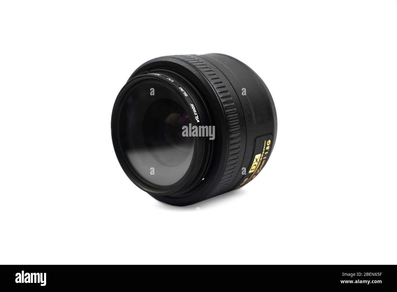 Single black color camera lens of a digital camera placed over an ...