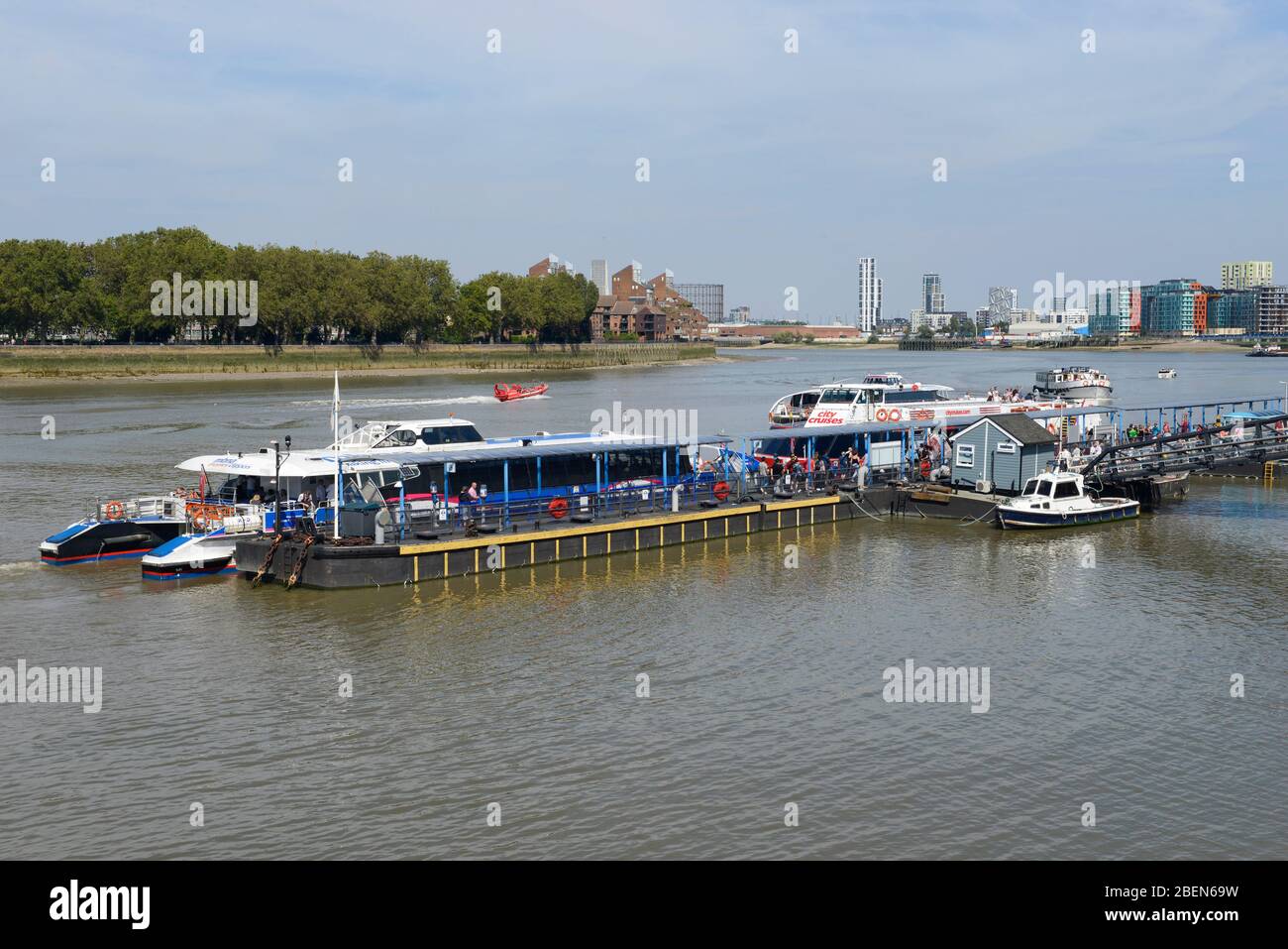 River ferries at the pier in Greenwich, London, UK Stock Photo - Alamy