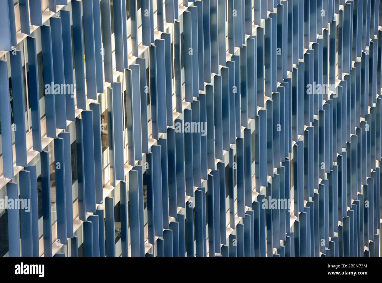 Front of an office building with movable window shades near the ...