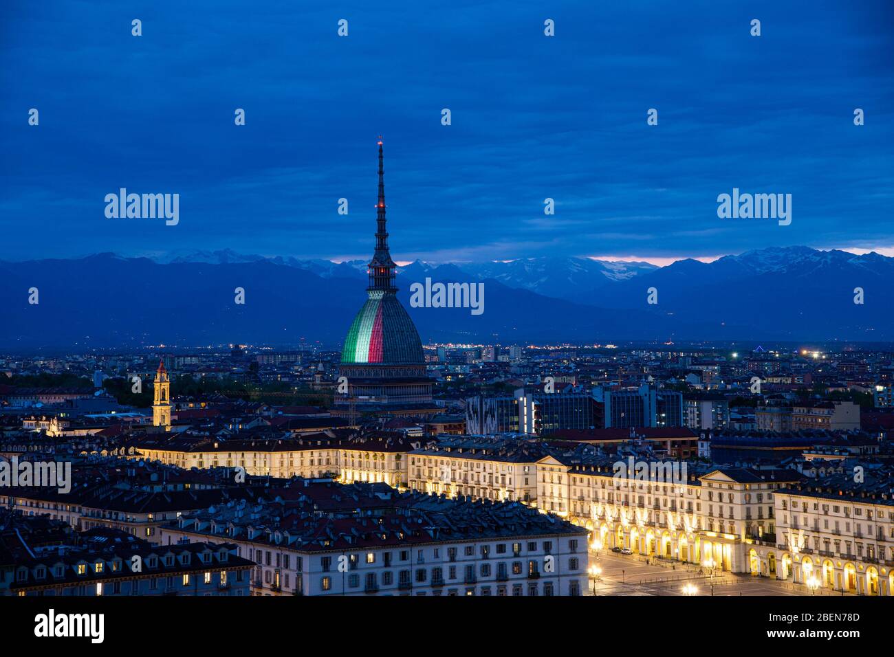 A view shows the Mole Antonelliana Turin with the colors of the Italian ...