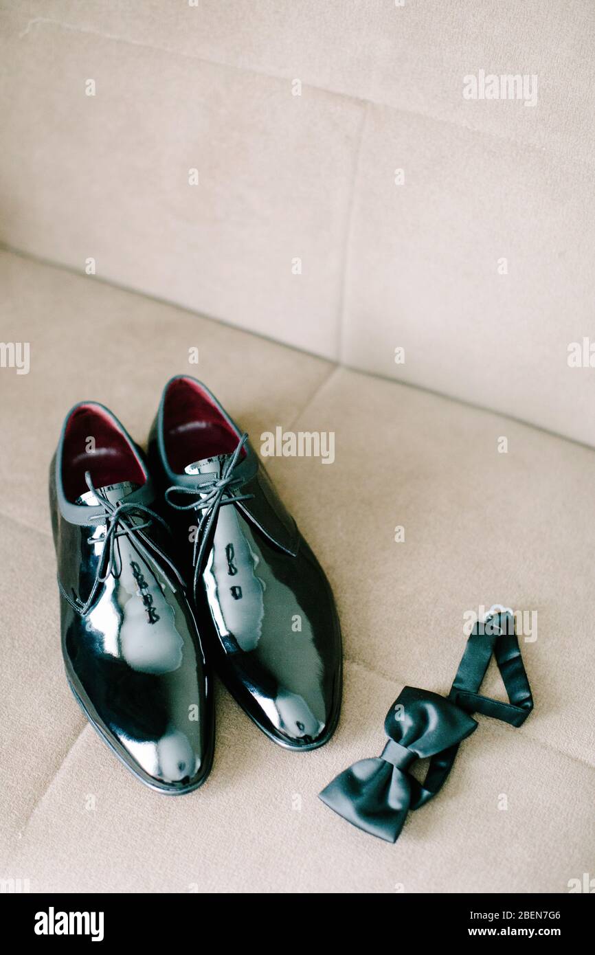 Black patent leather wedding shoes. Bow tie. Wedding reparations ...