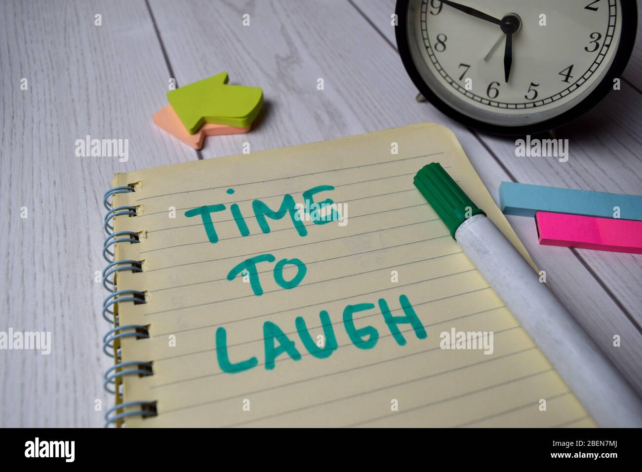 Time to Laugh write on a book isolated on Office Desk Stock Photo - Alamy