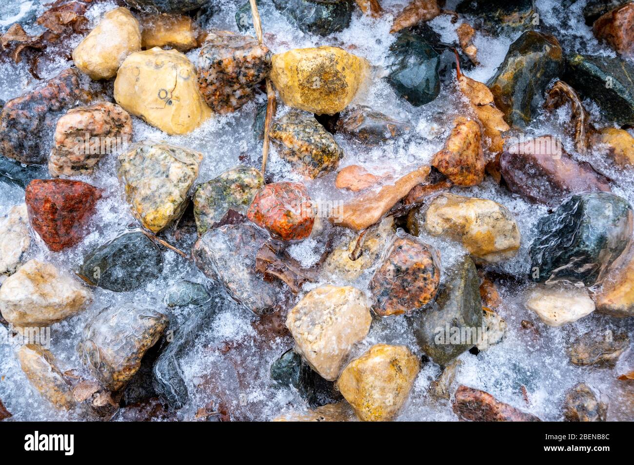 freezing rain caused icy glaze over decorate rocks Stock Photo - Alamy