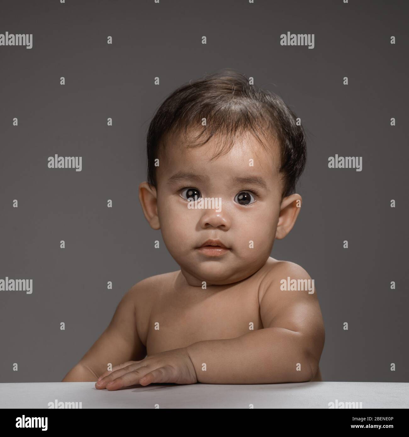 close up of baby face over grey background Stock Photo - Alamy