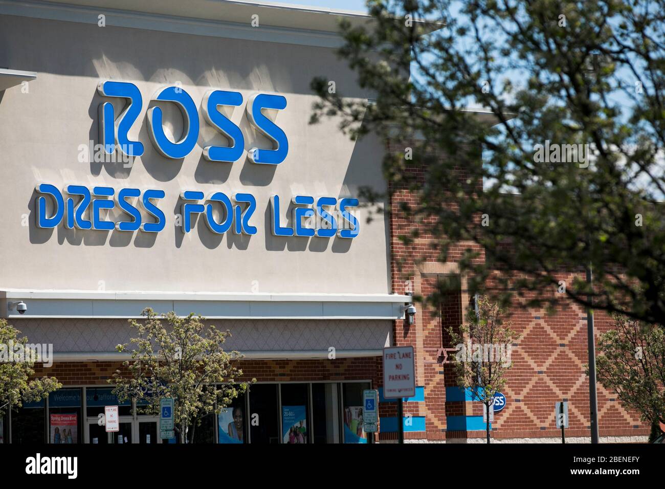 A logo sign outside of a Ross Stores retail store location in Stafford ...