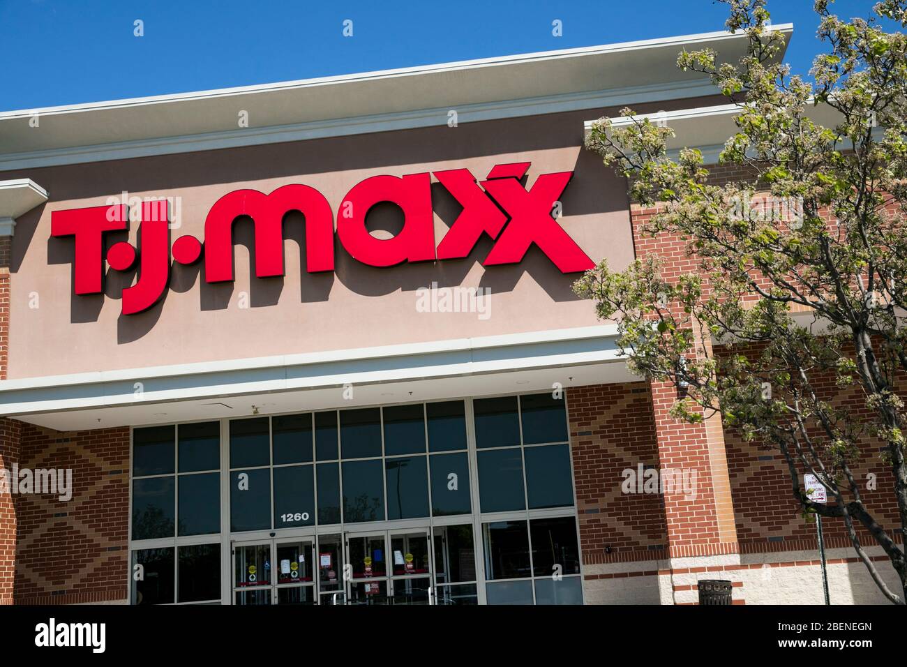 A logo sign outside of a TJ Maxx retail store location in Stafford ...