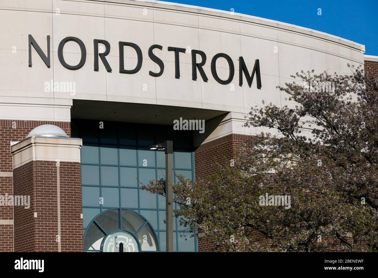 A logo sign outside of a Nordstrom retail store location in Bethesda ...