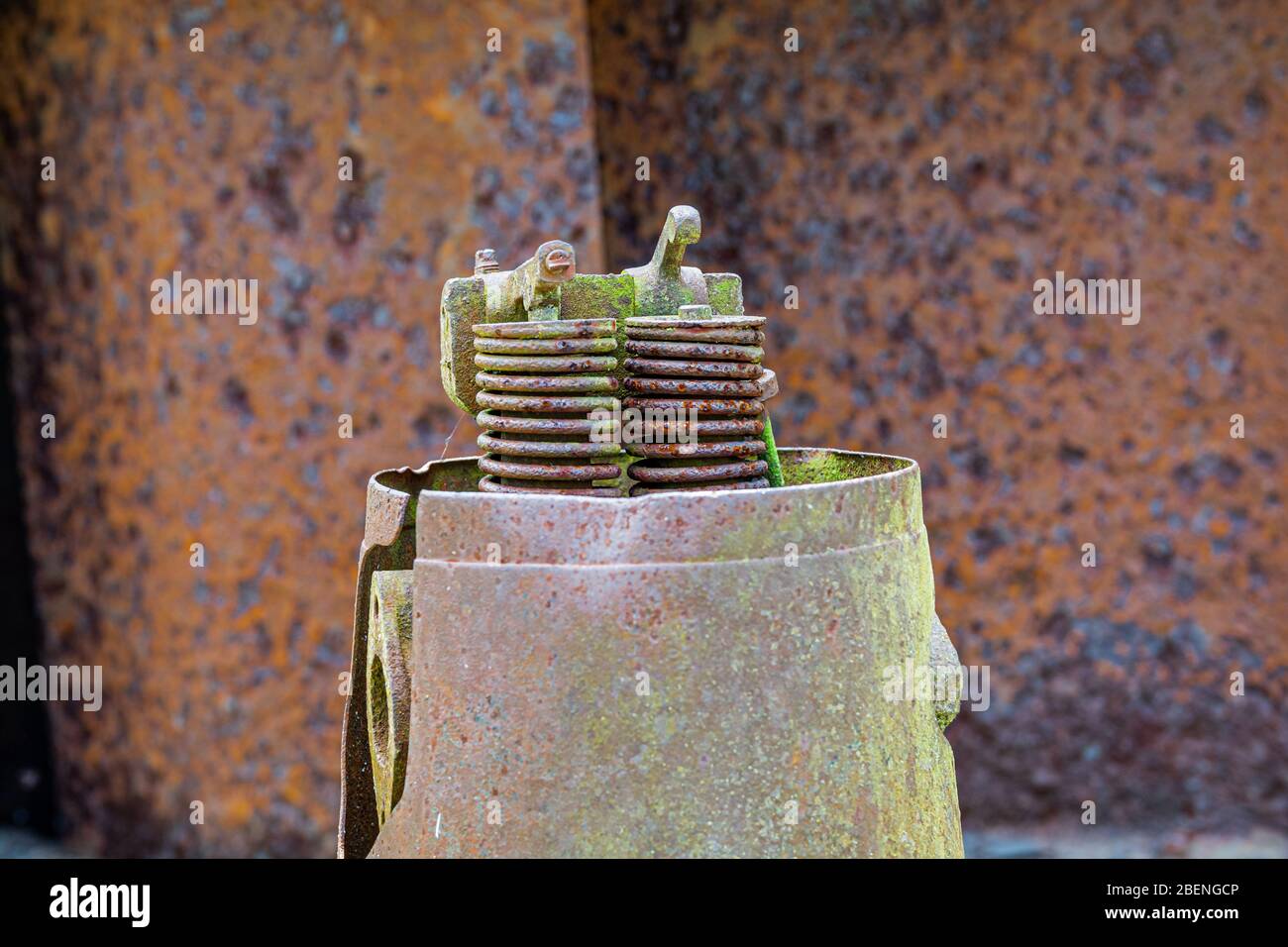 Rusty close up of coil and pipe intake Stock Photo - Alamy