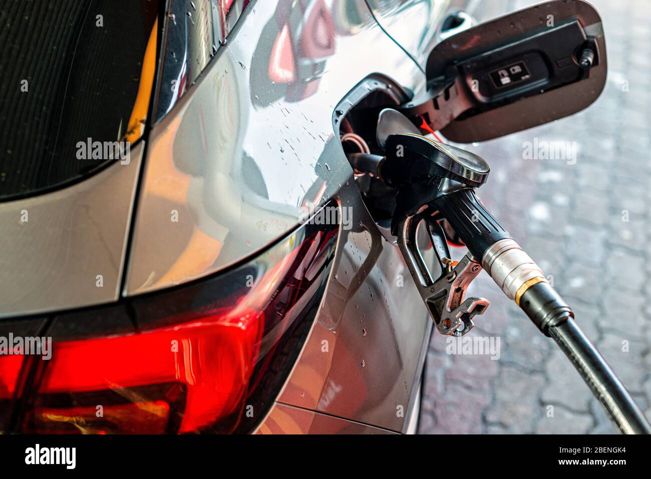 refueling car at the refuel station, rear view, car fuels concept Stock ...
