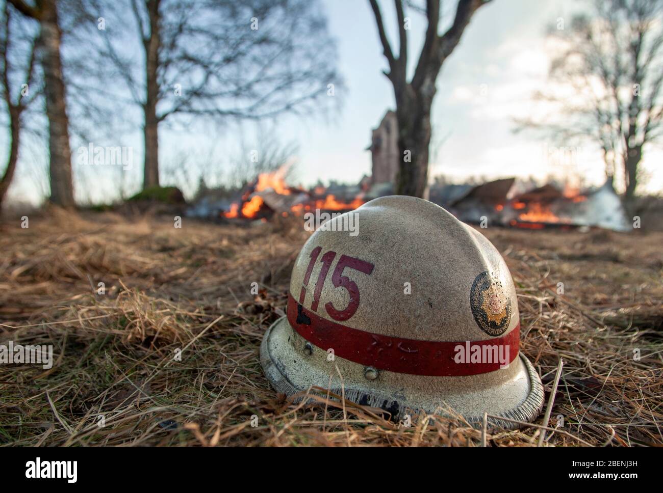 Firefighters trying to save burning house Stock Photo - Alamy