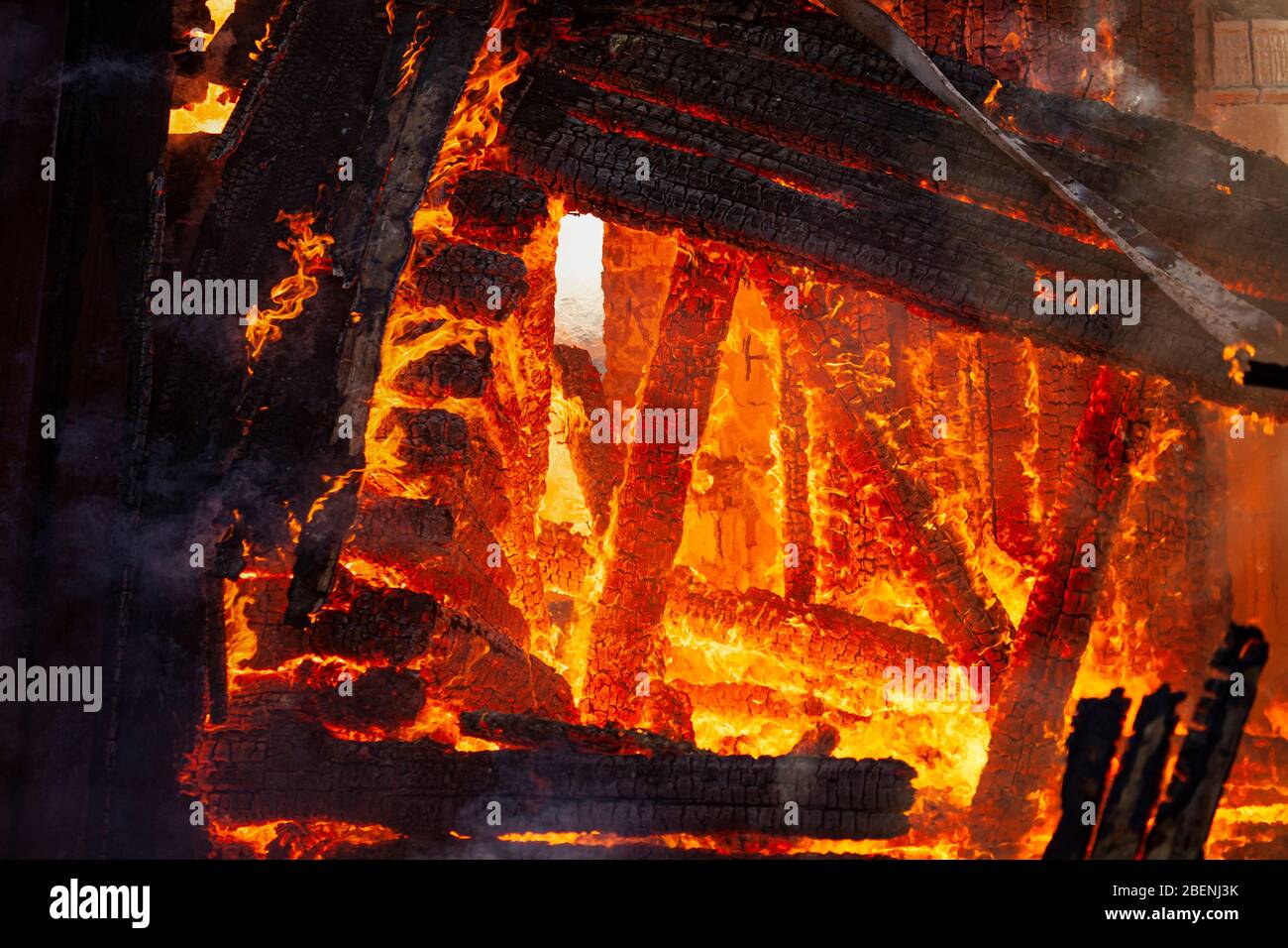Firefighters trying to save burning house Stock Photo - Alamy