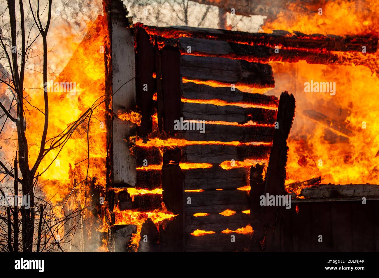 Firefighters trying to save burning house Stock Photo - Alamy