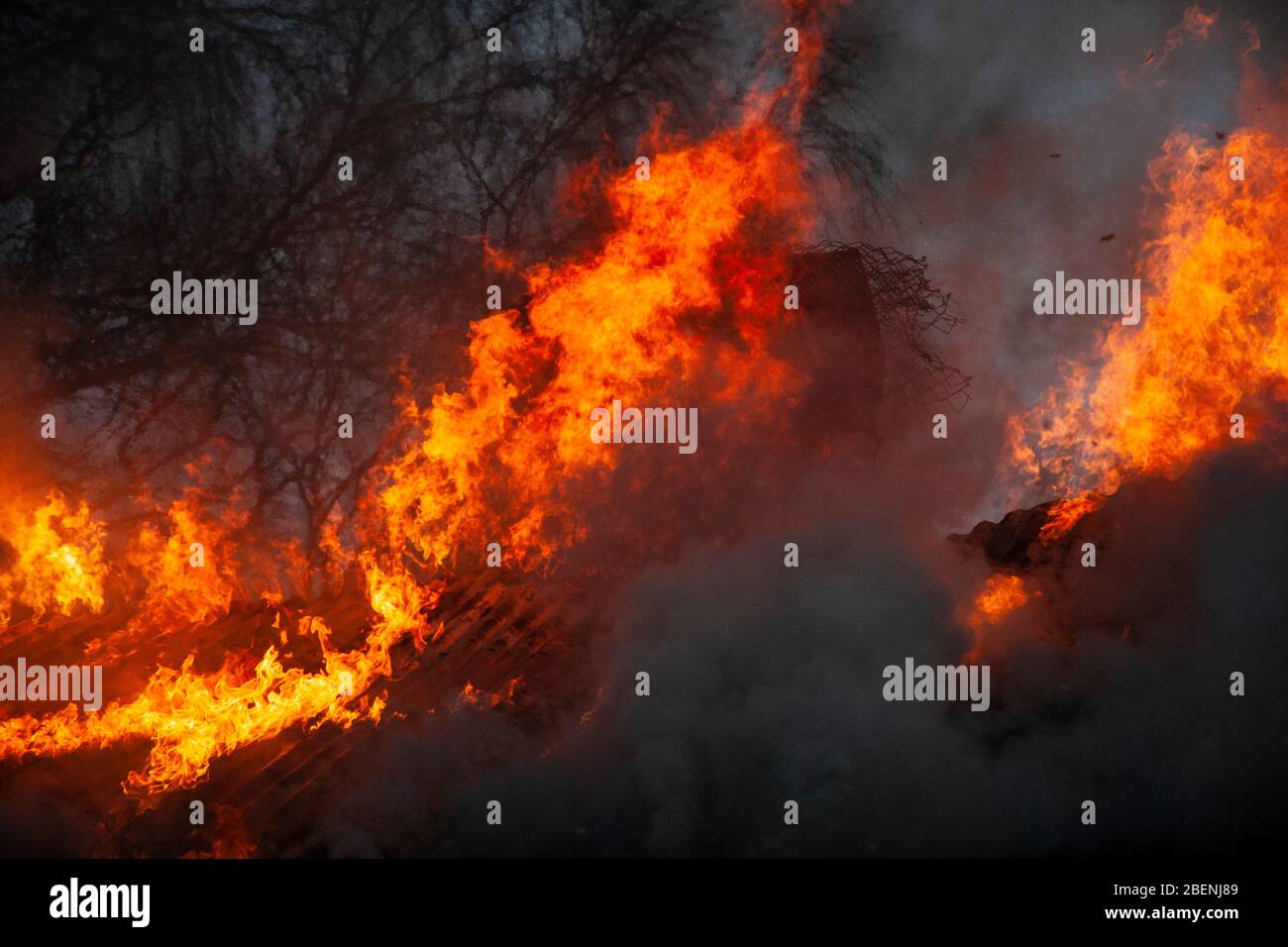 Firefighters trying to save burning house Stock Photo - Alamy