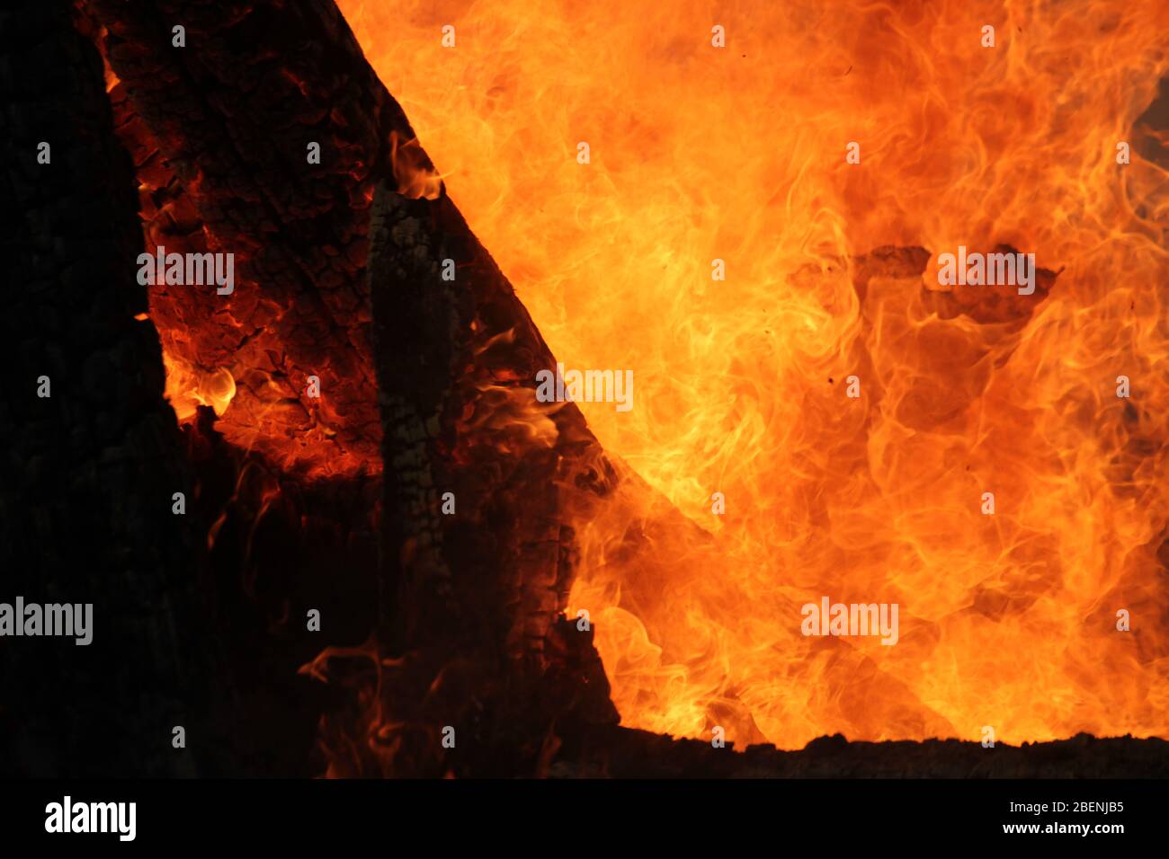 Firefighters trying to save burning house Stock Photo - Alamy