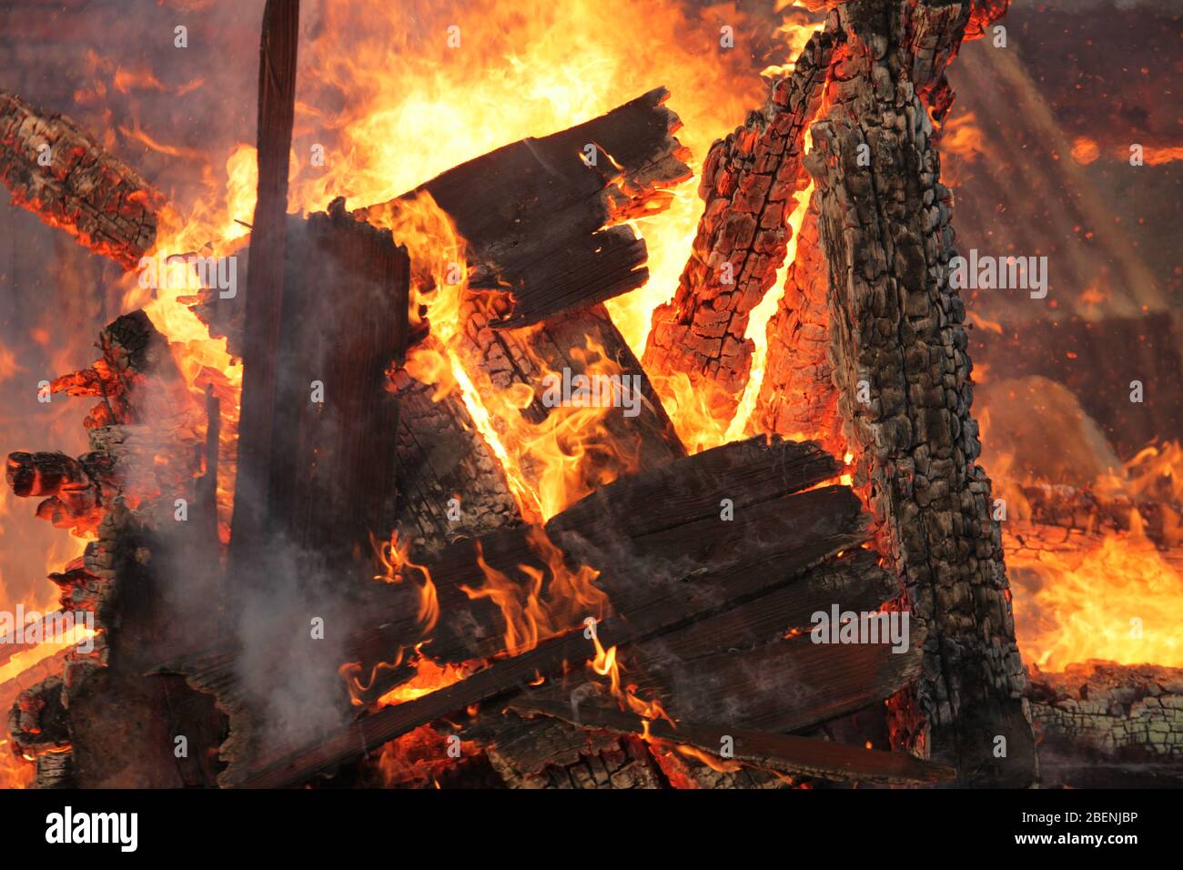 Firefighters trying to save burning house Stock Photo - Alamy