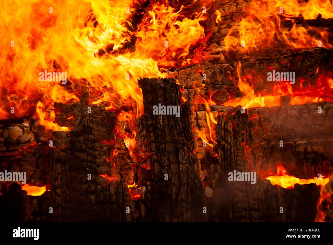 Firefighters trying to save burning house Stock Photo - Alamy