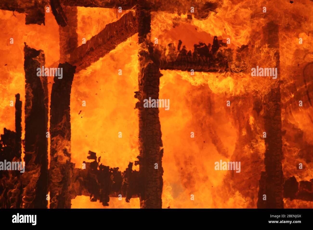 Firefighters trying to save burning house Stock Photo - Alamy