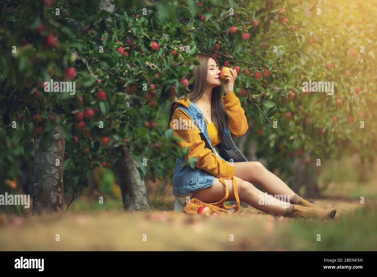 Sitting under the apple tree hi-res stock photography and images - Alamy