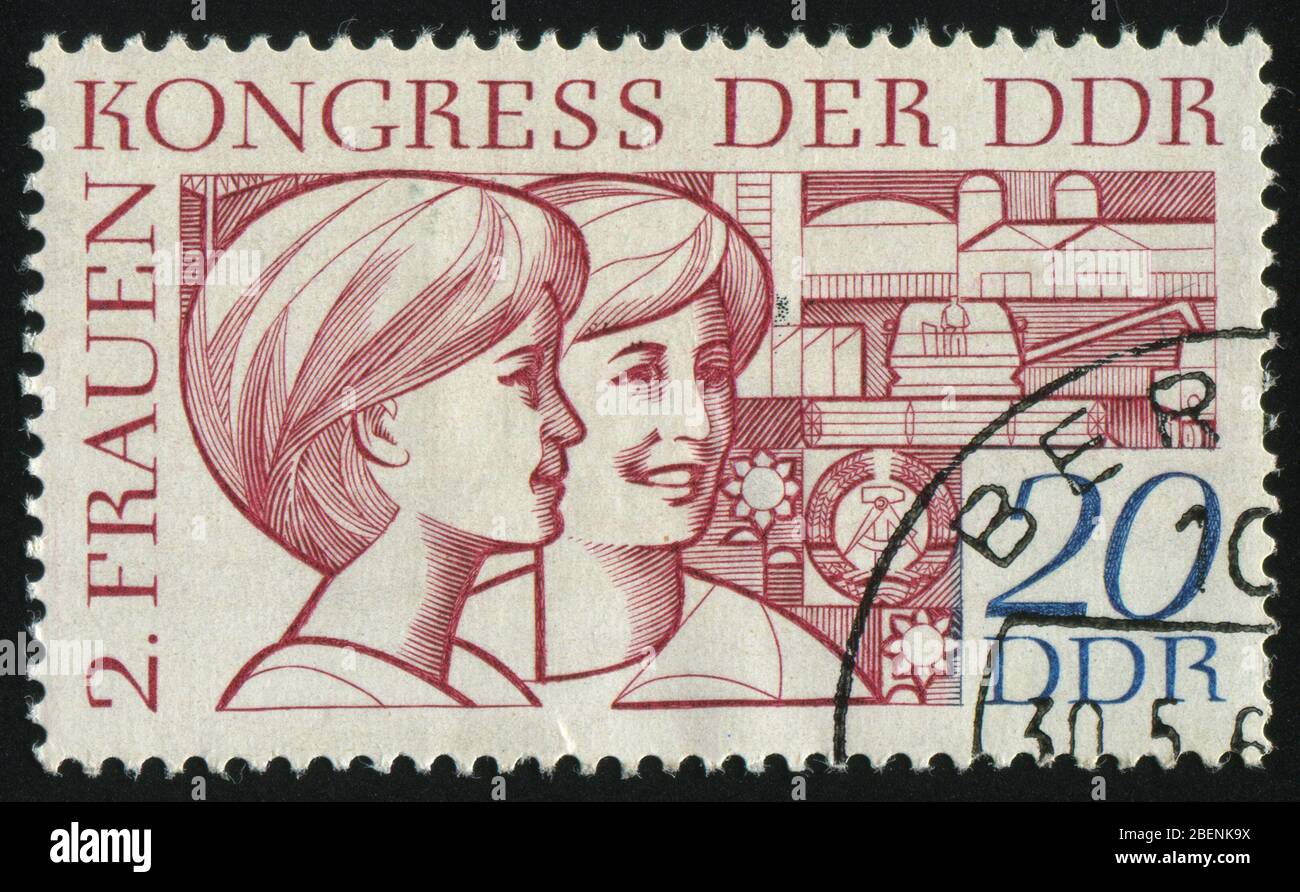 GERMANY- CIRCA 1969: stamp printed by Germany, shows Women and Symbols ...