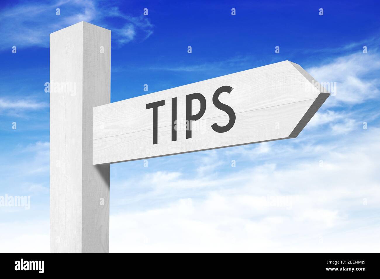 Tips - white wooden signpost with one arrow Stock Photo - Alamy
