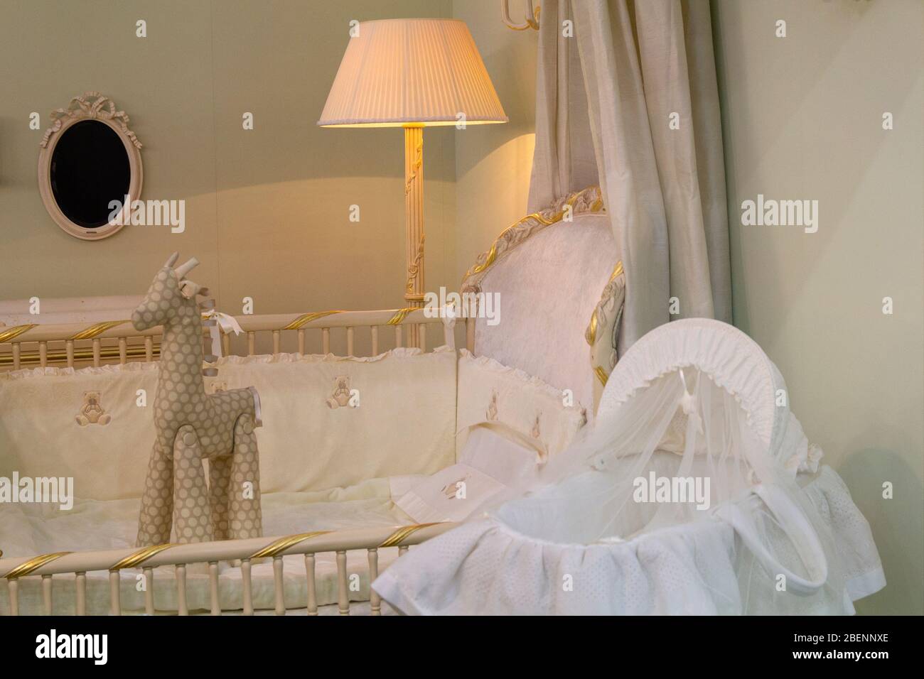 Cute baby's room with cradle. Interior Stock Photo - Alamy