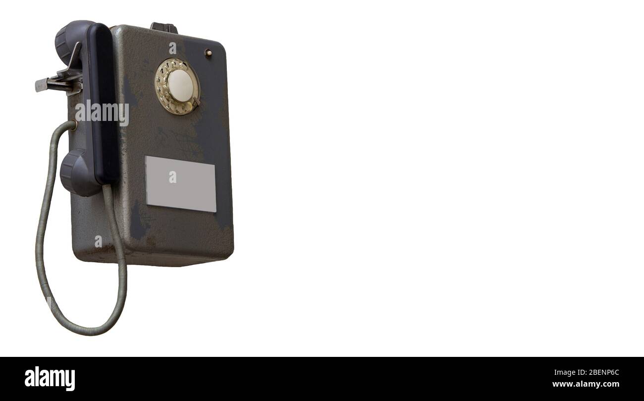 vintage rotary pay phone. old public telephone isolated over white ...