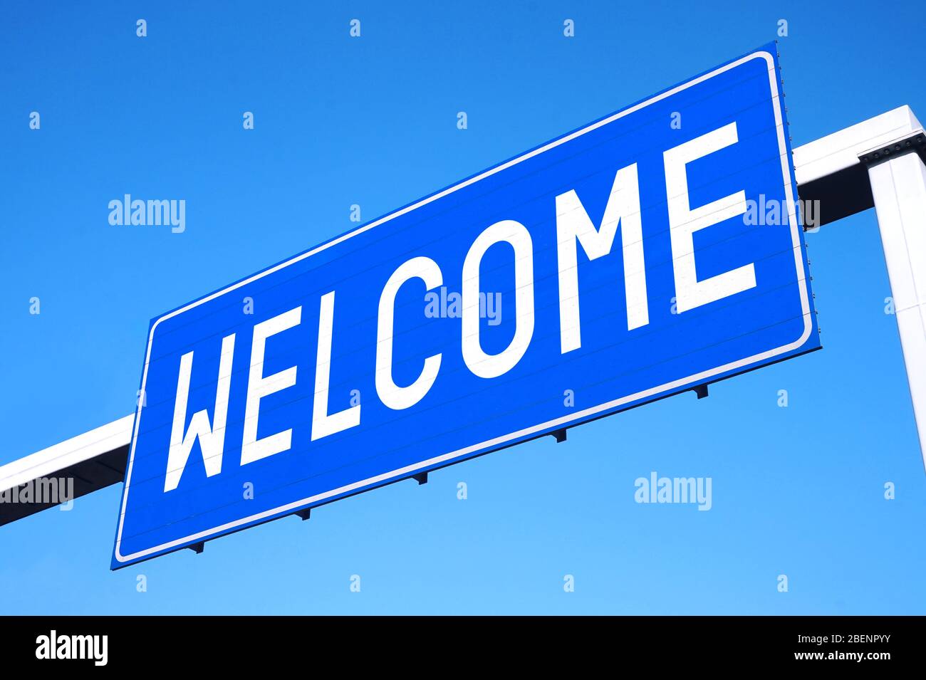 Welcome street sign Stock Photo - Alamy
