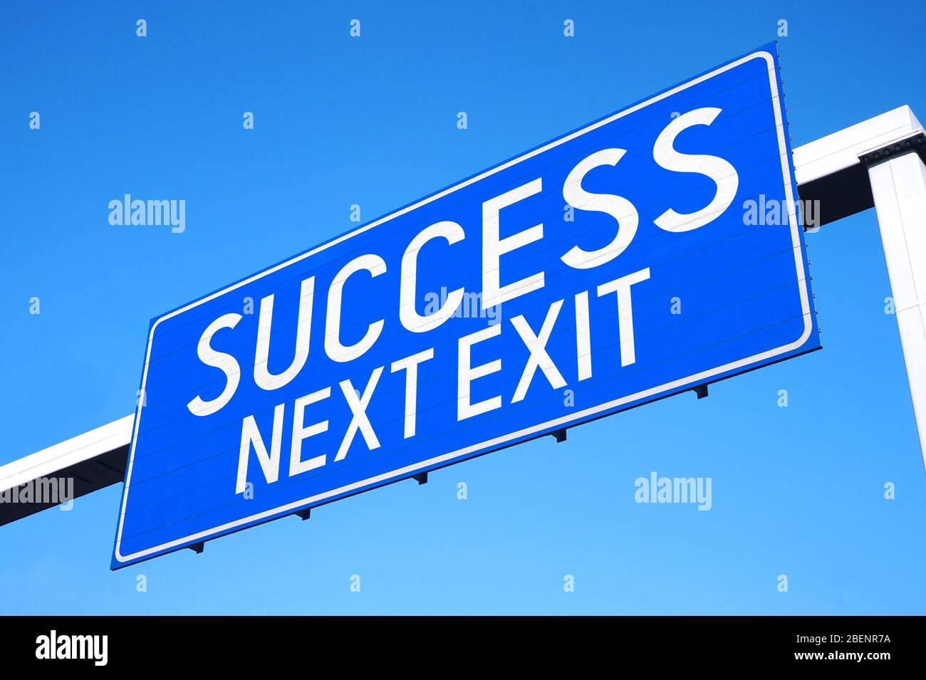 Success - next exit - street sign Stock Photo - Alamy