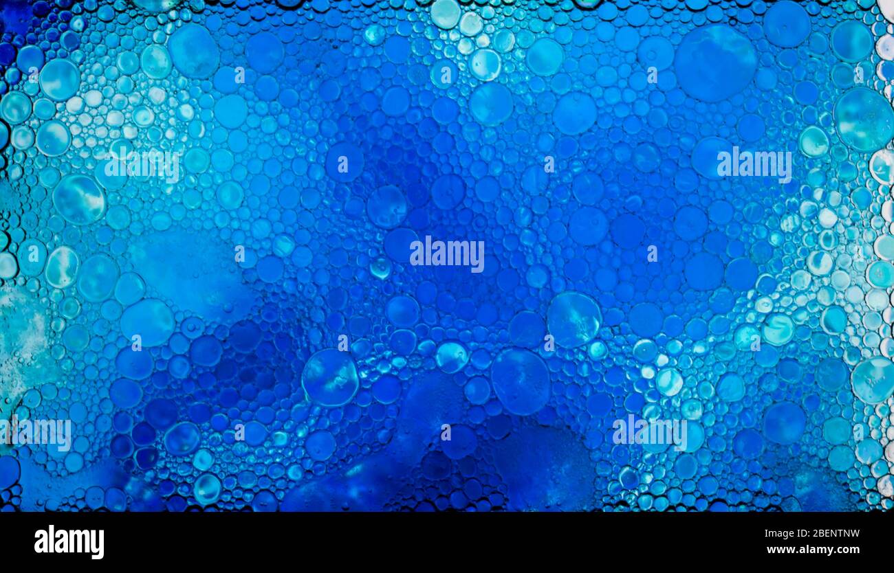 Neon blue abstract background with bubbles Stock Photo - Alamy