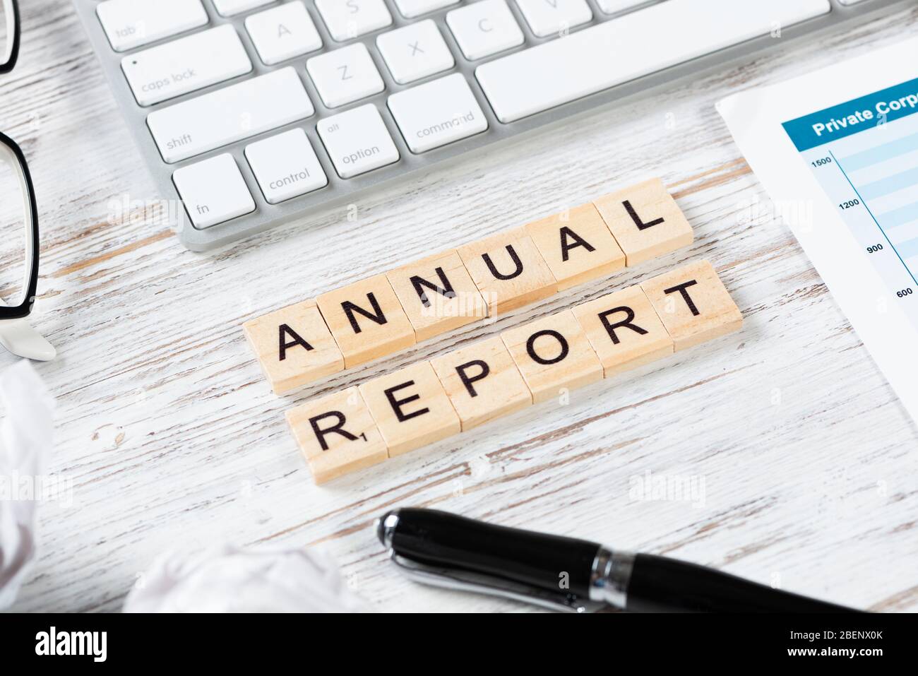 Annual report concept with letters on cubes Stock Photo - Alamy
