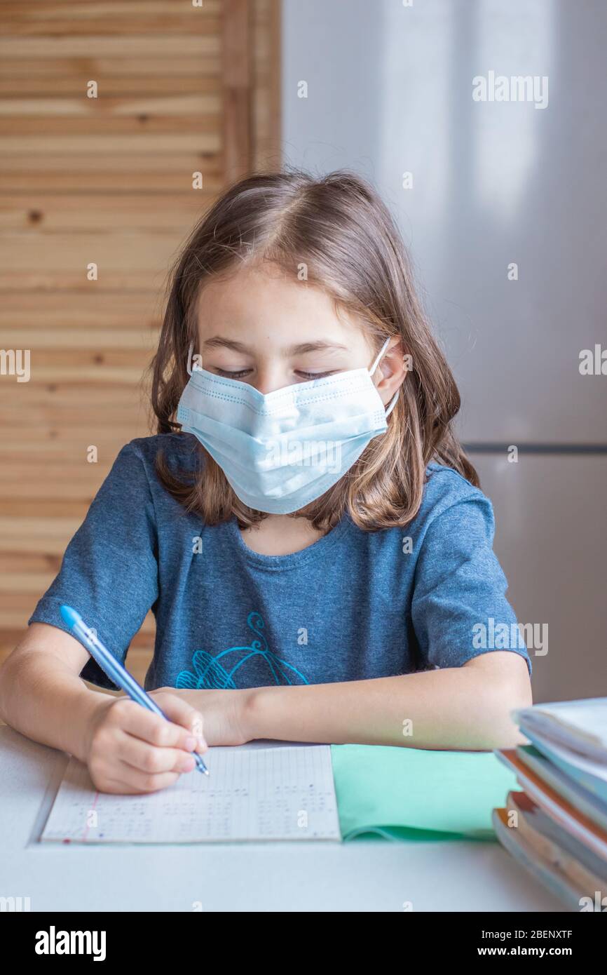 The child is engaged in home schooling. Quarantine at school. Pandemic ...