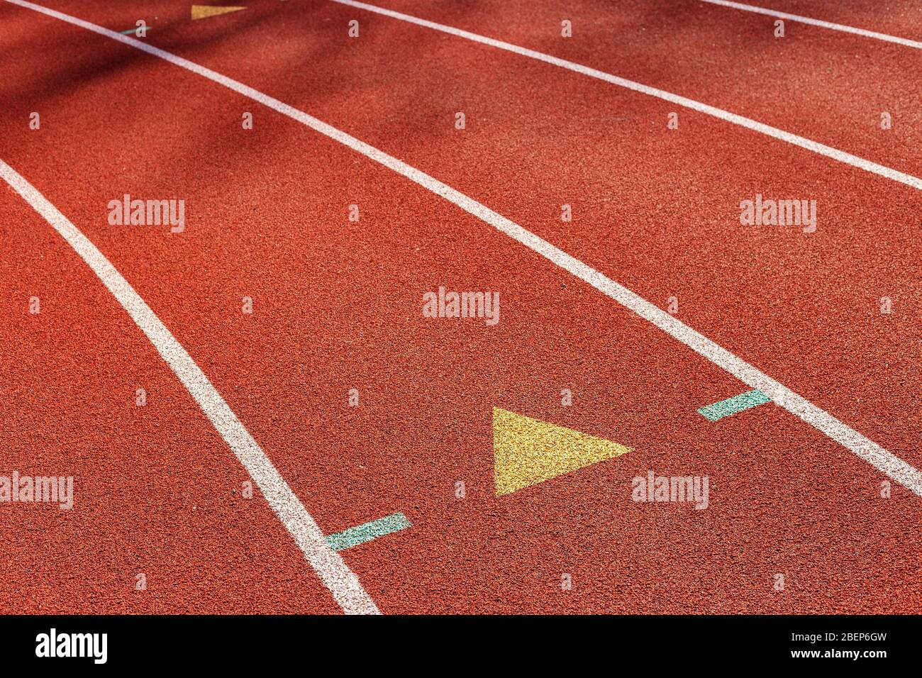 Red running track in school stadium. Sport recreation. Healthy ...