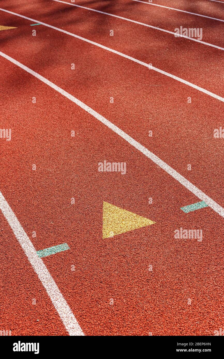 Red running track in school stadium. Sport recreation. Healthy ...