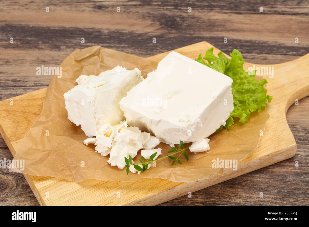 Greek traditional Feta soft cheese in the plate Stock Photo - Alamy