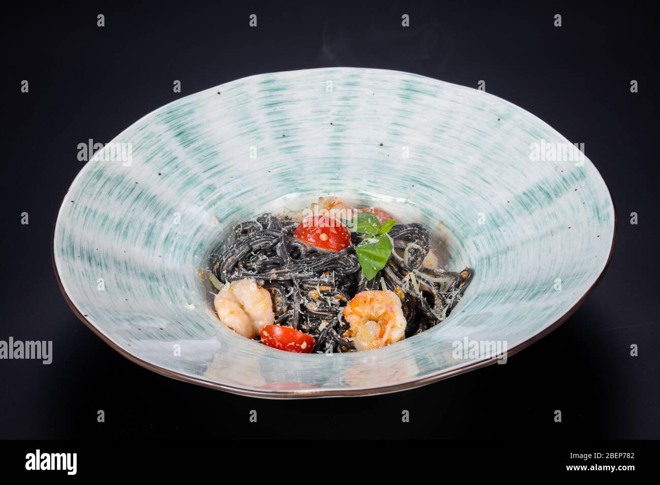 Black spaghetti pasta with tiger prawn Stock Photo - Alamy