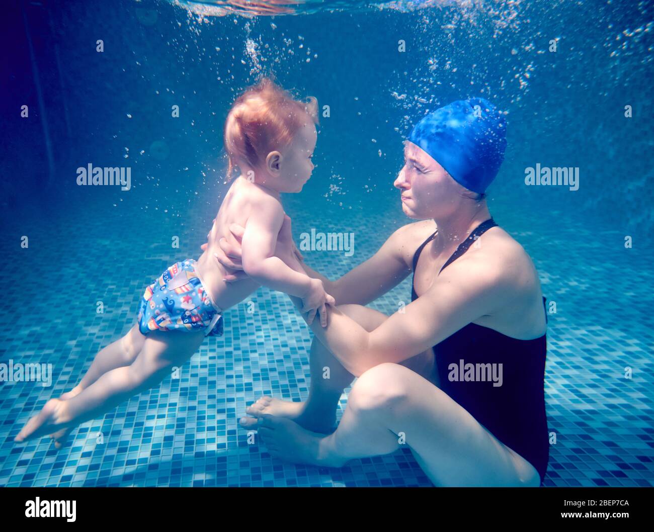 Woman swim dive swimming pool hi-res stock photography and images - Alamy