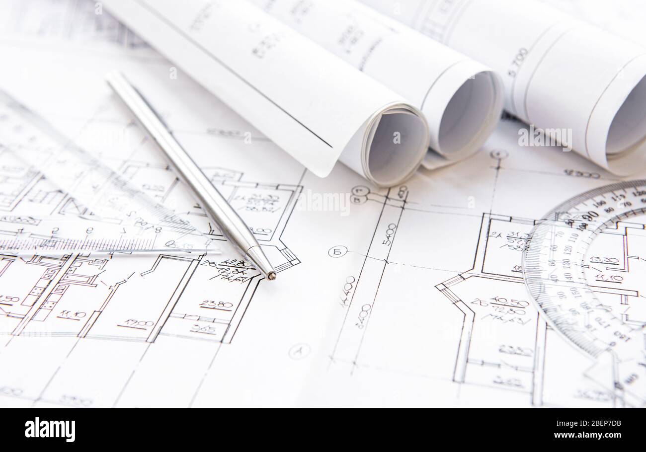 Architect workplace top view. Architectural project, blueprints ...