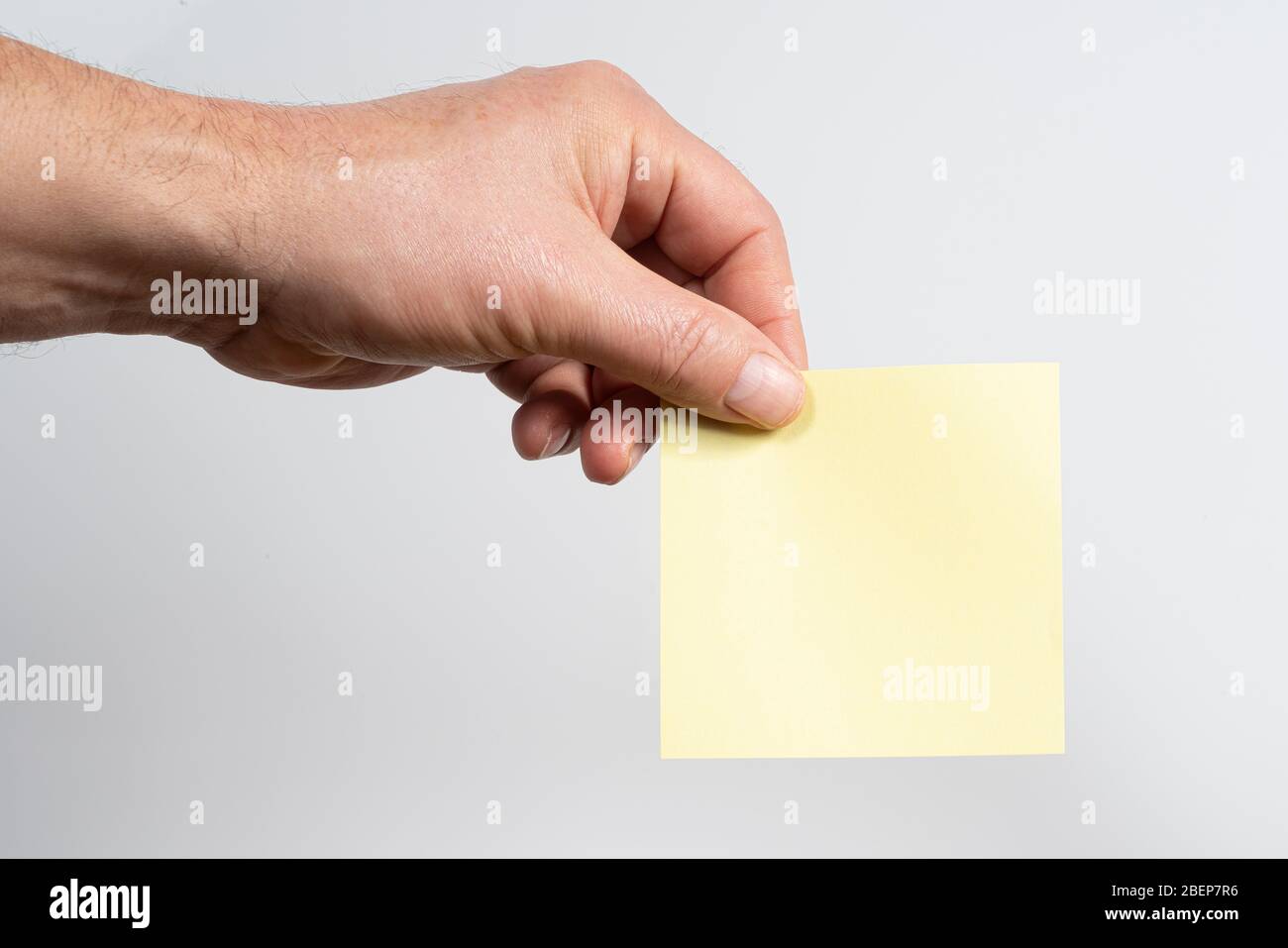 a colorful note sheet in your hand Stock Photo - Alamy