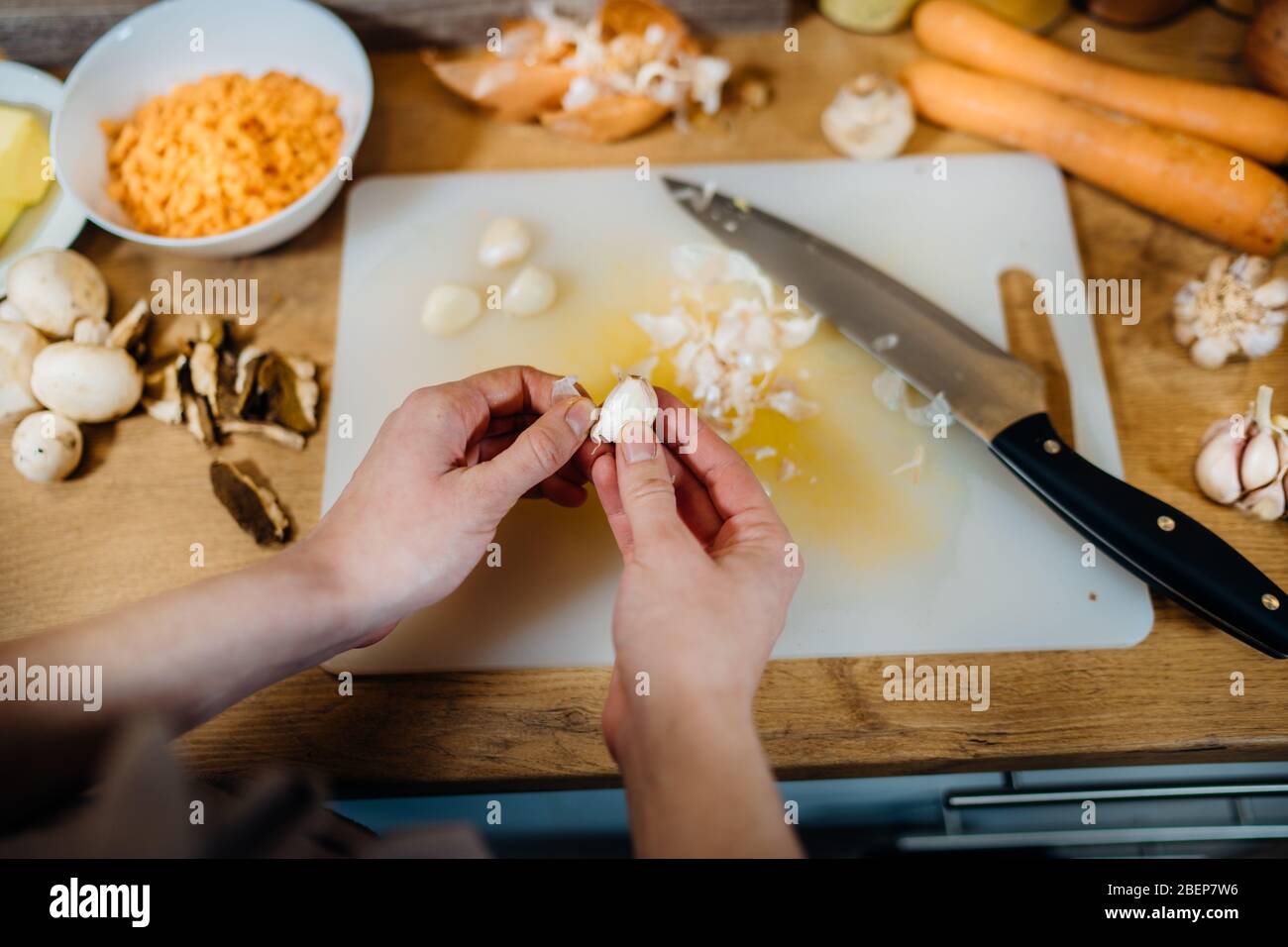 Peeling fresh garlic.Ingredients for cooking food with garlic.Healthy ...
