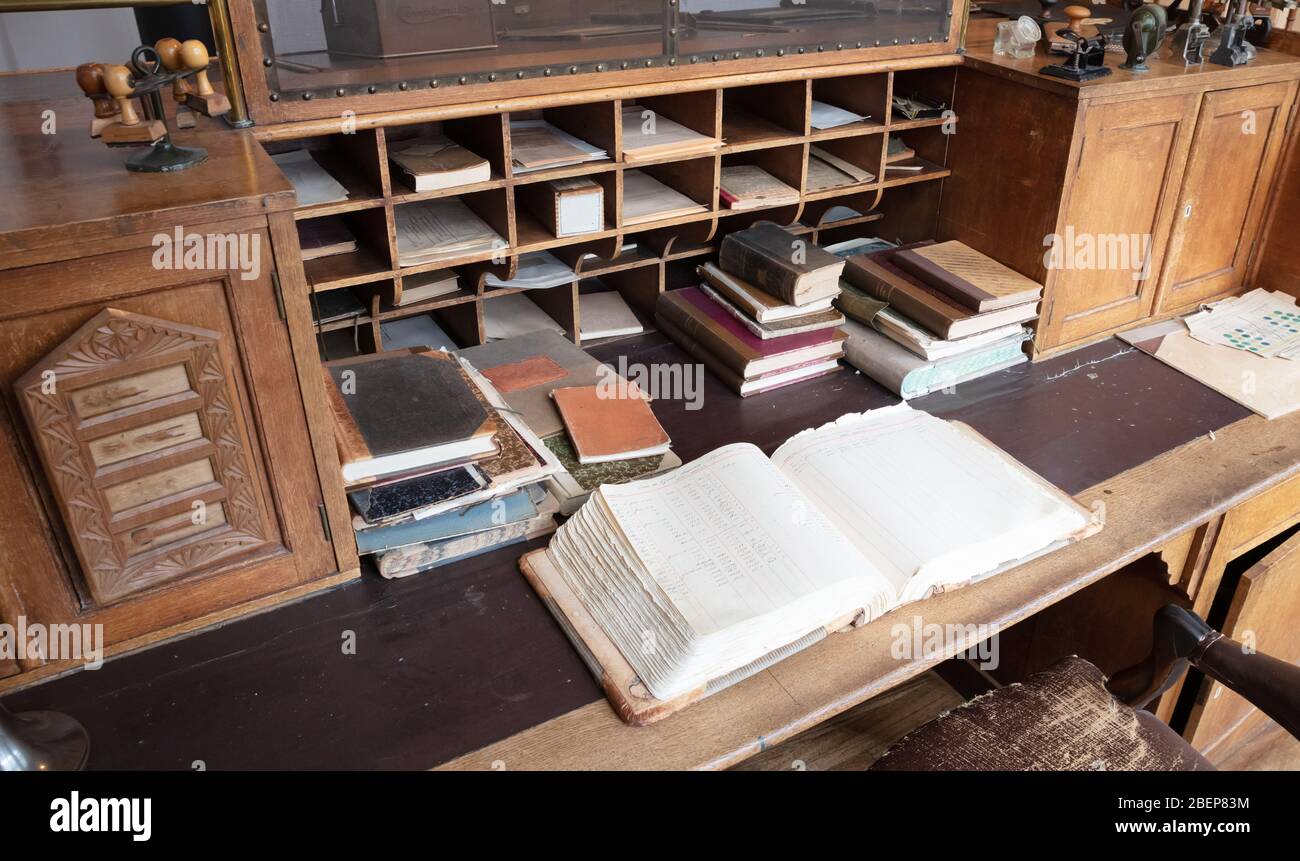 Very old desk, full of old books and old paper, the Netherlands ...