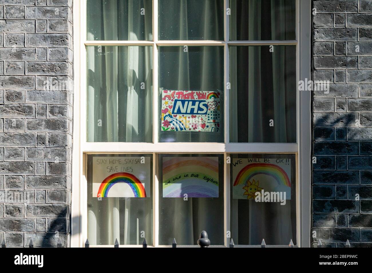 London, UK. 15th Apr, 2020. Rainbow/NHS posters in the windows of 10 ...