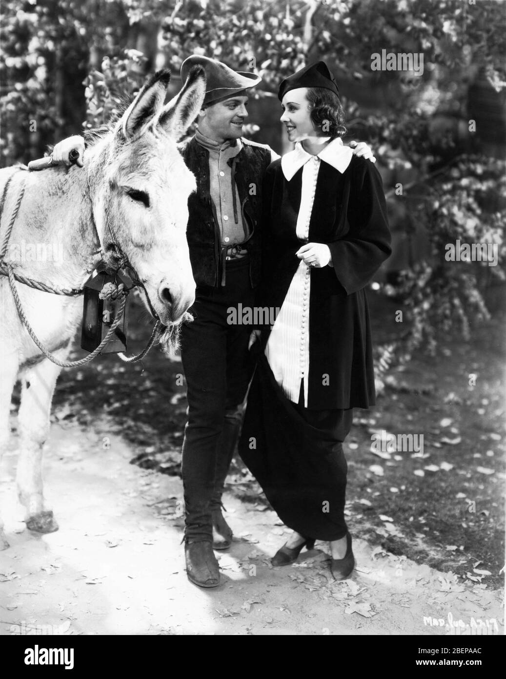 JAMES CAGNEY in costume as Bottom the Weaver with visitor to the set ...