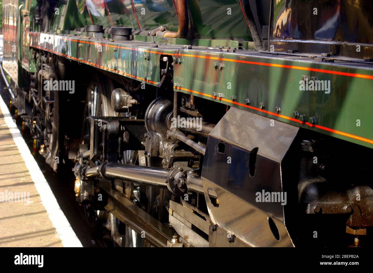 Green steam locomotive engine drive wheel assembly Stock Photo - Alamy