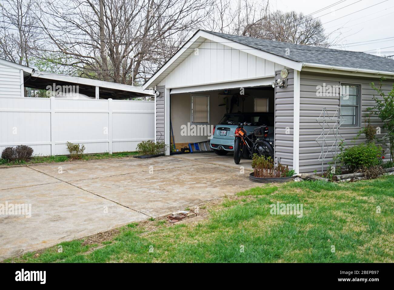 Exterior architecture and design of backyard garage with 'MINI COOPER ...