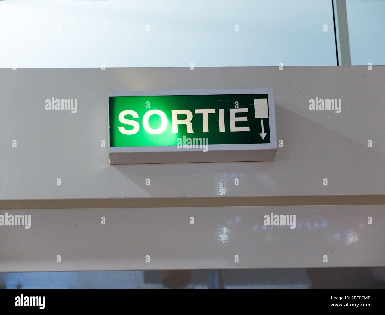 French exit «Sortie» light panel with direction indicator Stock Photo ...