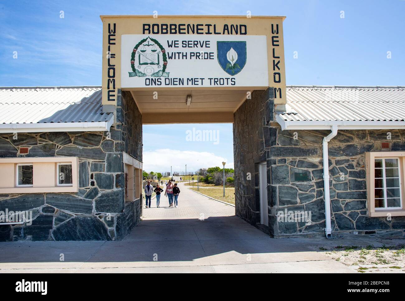 The main gate to the prison bears a welcome sign. It is in the harbour ...