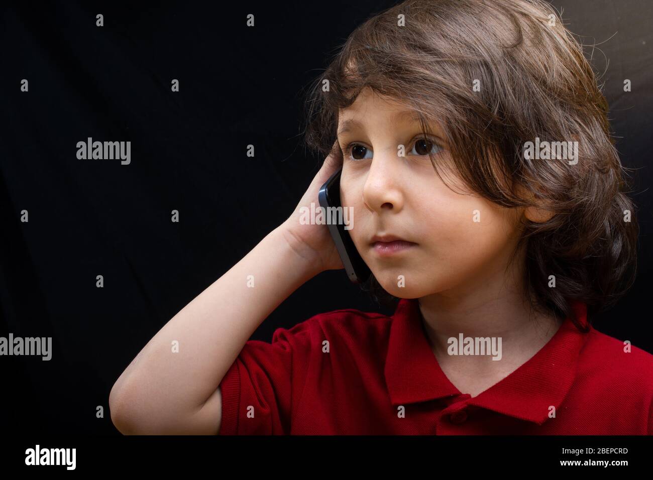 Little boy hold smartphone as modern mobile communication gadget Stock ...